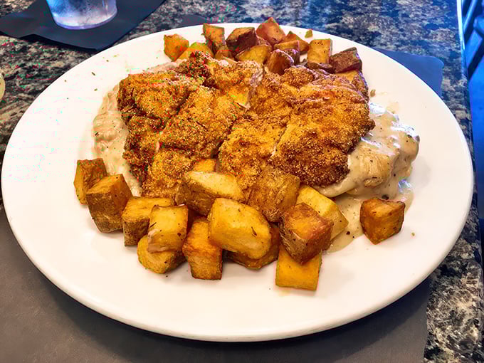 Biscuits and gravy that could make a Southerner weep with joy. Golden, crispy chicken nestled on a bed of creamy comfort &ndash; it's a hug on a plate.
