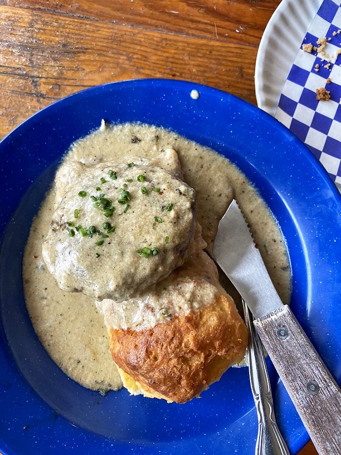 Biscuits and gravy that could make a grown man weep. It's not just breakfast; it's a religious experience on a blue plate.