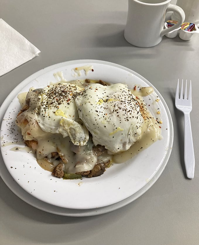 Biscuits and gravy with poached eggs? More like clouds of joy topped with golden orbs of happiness. Breakfast nirvana achieved!