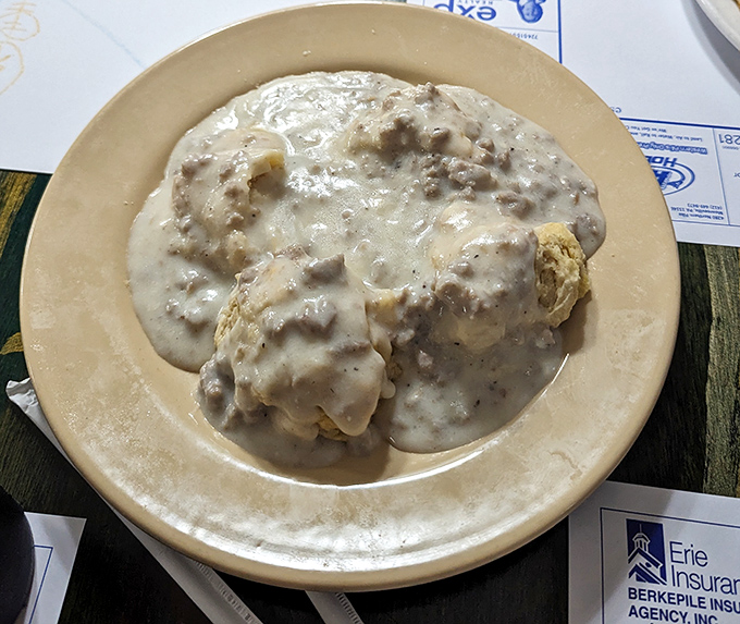 Biscuits and gravy: Where cloud-like dough meets a river of savory bliss. It's not a meal; it's a religious experience.