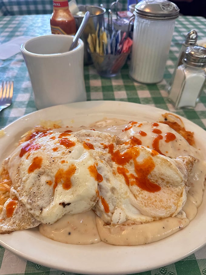 Holy gravy, Batman! These biscuits are drowning in a sea of peppery goodness. It's like a warm, savory hug for your taste buds.