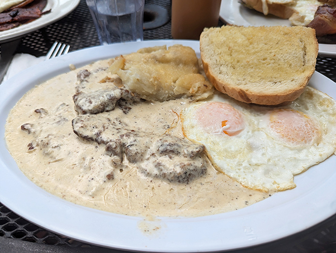 Holy gravy, Batman! This plate of biscuits and gravy could make a grown man weep with joy.