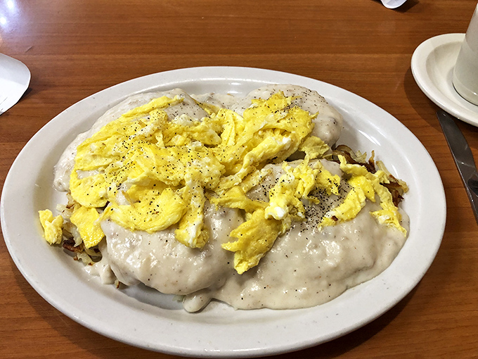 Eggs-actly what the doctor ordered! These biscuits and gravy look like they could cure anything from a hangover to a broken heart.