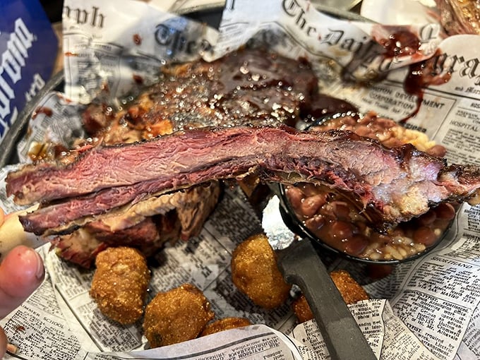 Holy smoke rings, Batman! These bison ribs look so tender, they might just melt before you can say "pass the napkins."