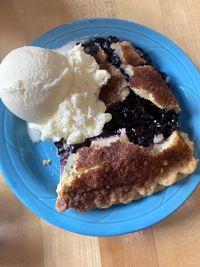 Blueberry pie so vibrant, it could make a painter jealous. Each bite is a burst of summer sweetness.