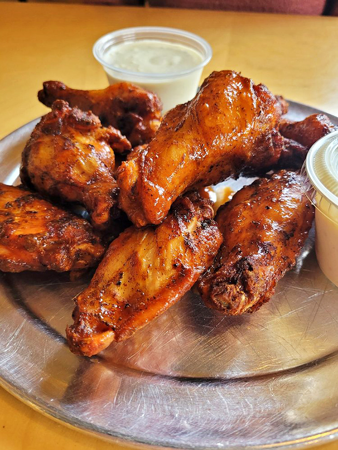 These aren't just wings; they're the reason GPS was invented. Smoked, fried, and sauced to perfection with house-made ranch standing by for duty.