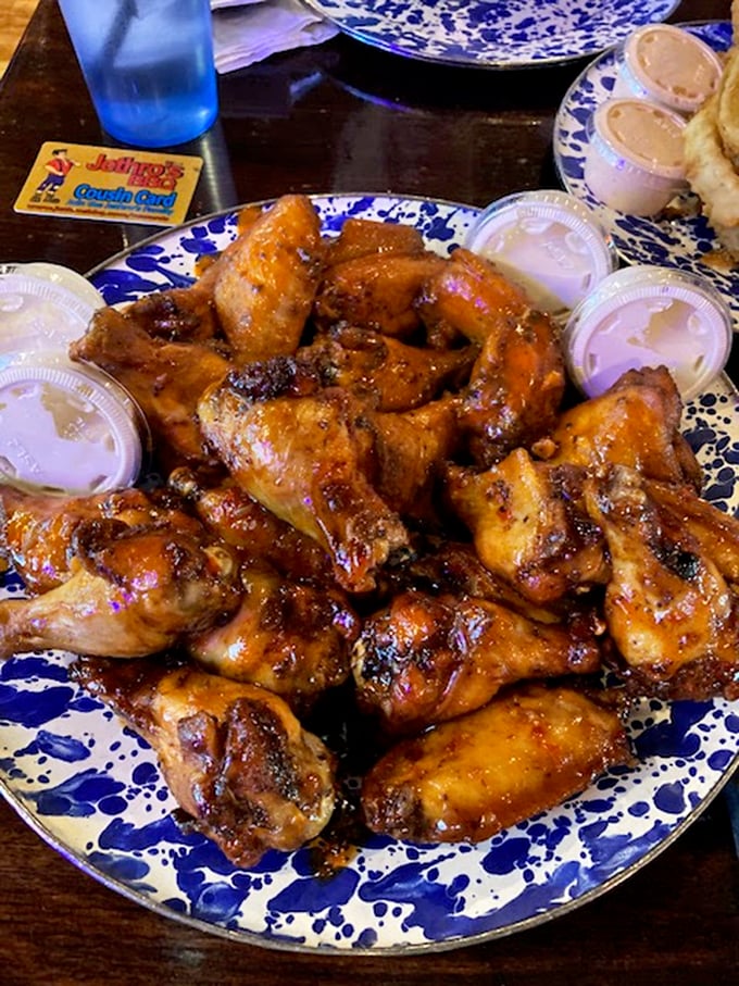 Holy smokes, Batman! These wings aren't just food; they're a religious experience. Crispy, saucy, and piled high &ndash; resistance is futile.