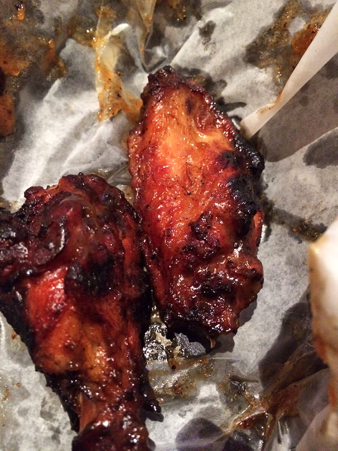 These wings aren't just food, they're a religious experience. Crispy, saucy, and more heavenly than a choir of angels singing "Finger Lickin' Good."