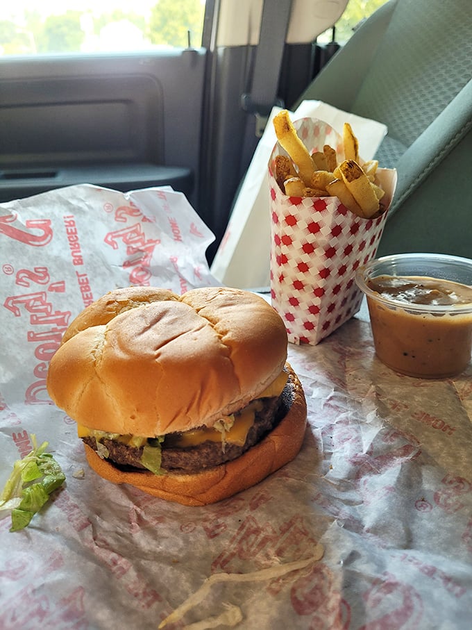 The holy trinity of fast food perfection: a juicy burger, golden fries, and a shake that's thicker than your grandma's photo album.