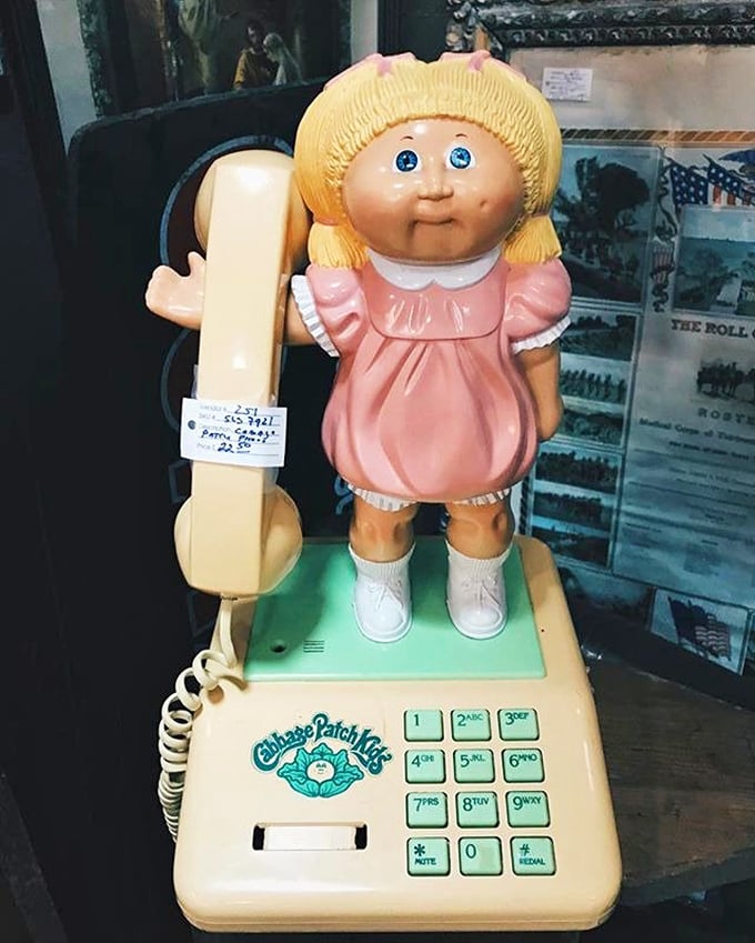 Ring ring! The 80s called, and they want their Cabbage Patch Kid phone back. This adorable blast from the past is ready to take your call... if you can figure out how to dial it.