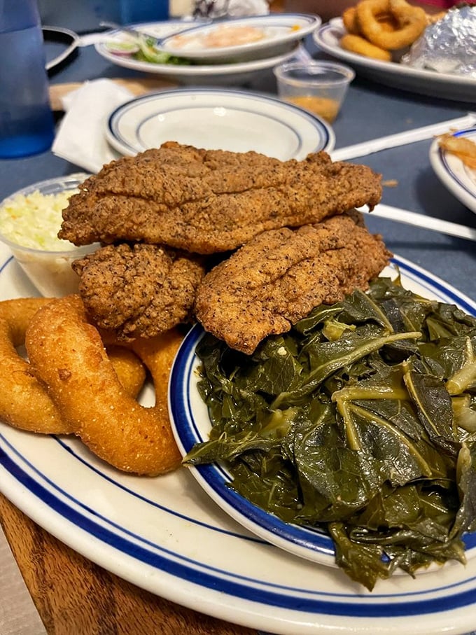 Southern comfort on a plate! This crispy catfish and collard greens combo is the culinary equivalent of a warm hug.