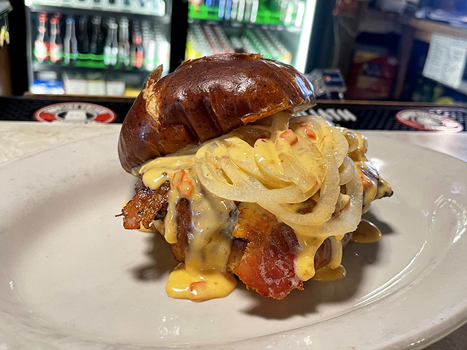 Holy moly, that's a burger! This cheese-draped behemoth could make Paul Bunyan say, "I'm gonna need a bigger axe."