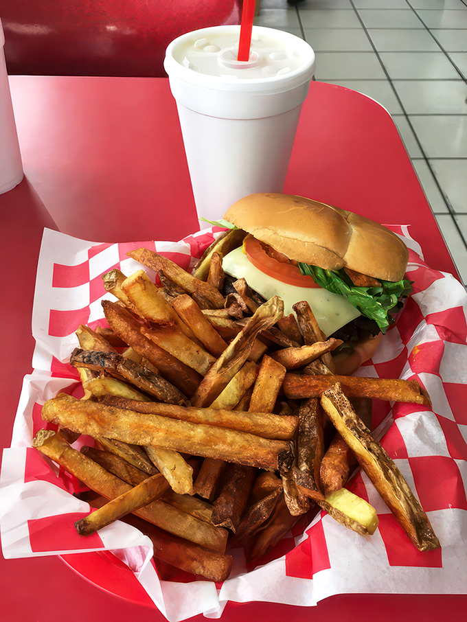 Holy cow! This burger-and-fries combo is the stuff of dreams. It's like a hug for your stomach, only with more cheese and fewer awkward moments.