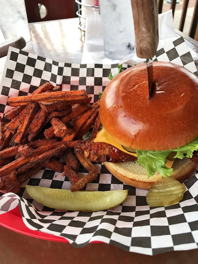 This isn't just a sandwich, it's a tower of temptation. Grab some napkins and prepare for delicious defeat.