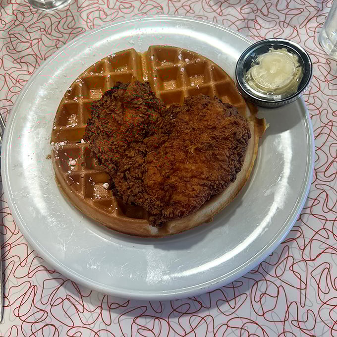 Holy crispy crunch, Batman! This chicken and waffle combo is the superhero duo your taste buds have been waiting for.