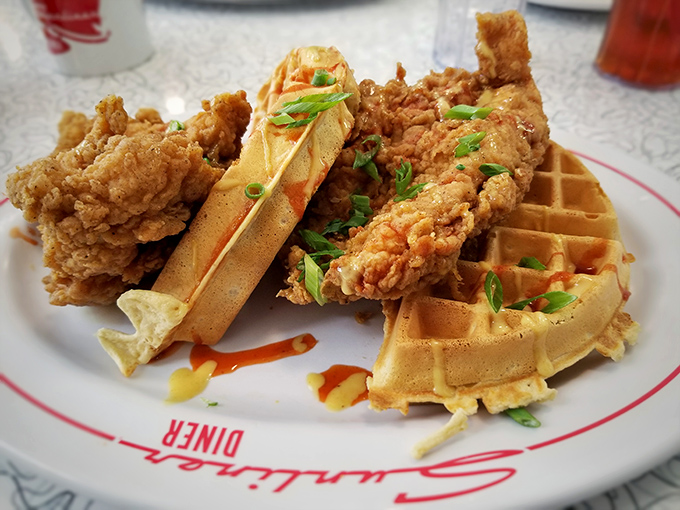Holy crispy deliciousness, Batman! This chicken and waffle combo is what breakfast dreams are made of. Pass the syrup, please!