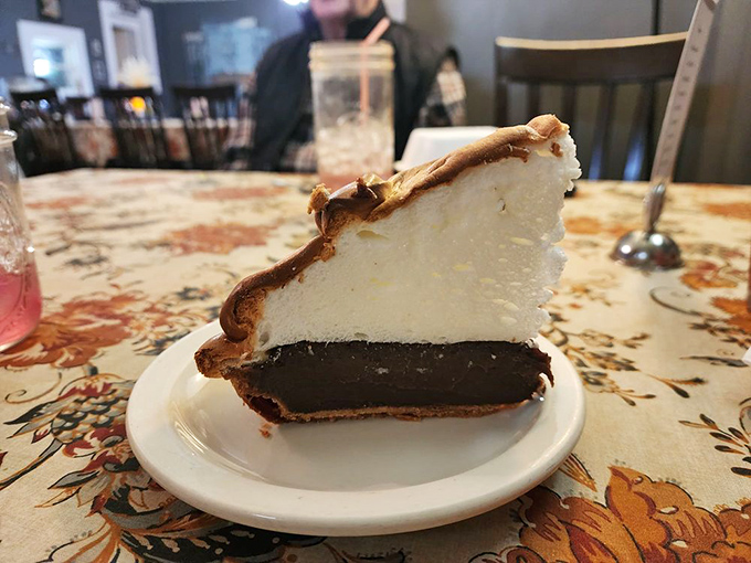 Behold the Chocolate Mile High pie – a towering testament to the fact that sometimes, more is definitely more.