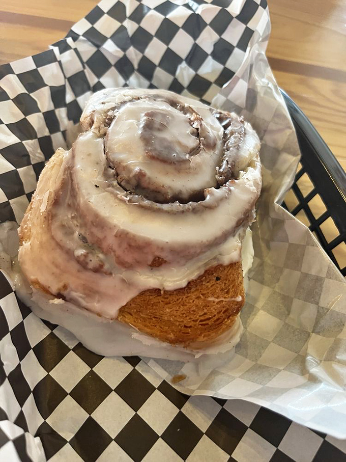 Behold, the crown jewel of pastries! This cinnamon roll is so generously frosted, it could make even the Pillsbury Doughboy blush.