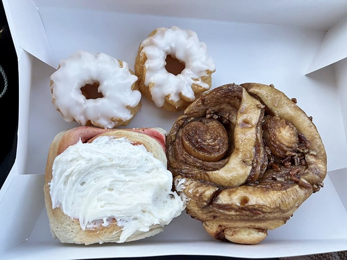 Breakfast of champions? You bet your sweet tooth! This box of joy features cinnamon rolls that could make a grown man weep.