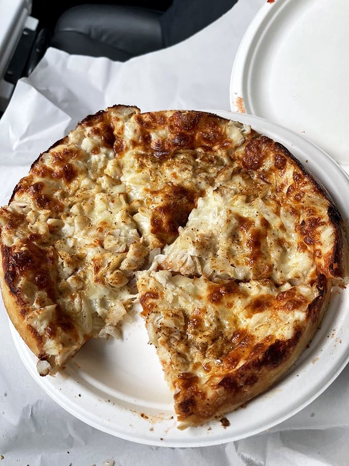 The Crab Pie: Where Baltimore meets Italy in a delicious dance! This golden-crusted beauty is topped with succulent crab meat, making it the catch of the day.