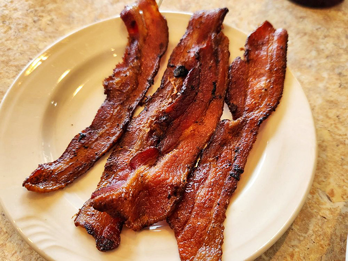 Bacon lovers, rejoice! These crispy strips are the stuff of pork-fueled fantasies – a salty, smoky symphony that would make even Ron Swanson proud.