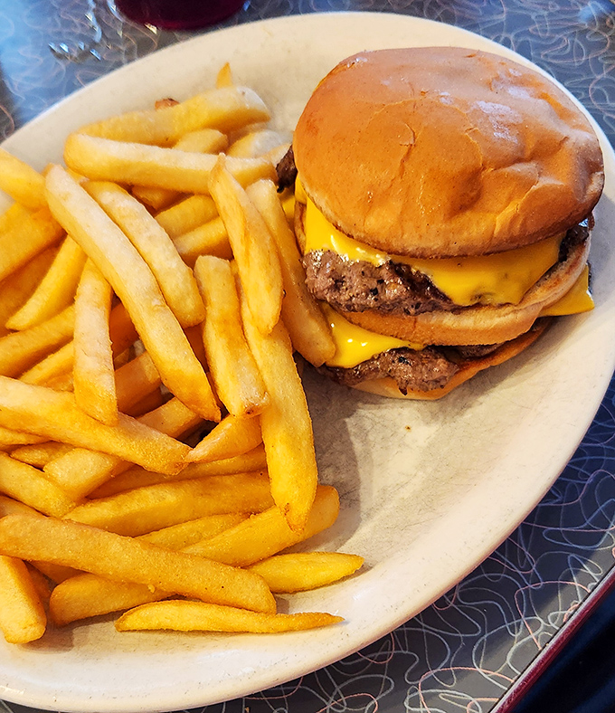 Holy cow, what a burger! This double cheeseburger isn't just a meal, it's a work of art on a bun.