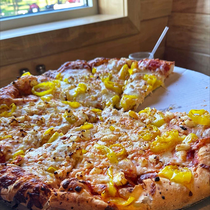 Sunshine on a plate! This vibrant pizza topped with banana peppers is like a Ray of Sunshine for your taste buds &ndash; no SPF required.