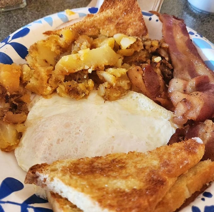 Breakfast of champions? More like breakfast of food-venture seekers! This plate is a symphony of flavors that'll wake up even the sleepiest taste buds.