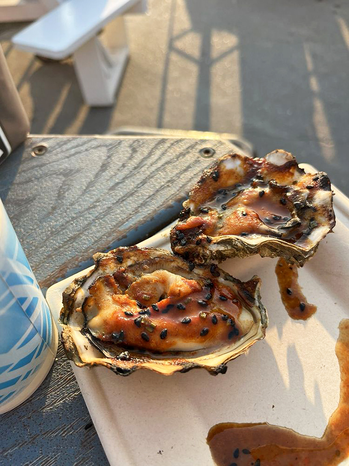 These grilled oysters aren't just food; they're edible works of art. Smoky, briny, and oh-so-buttery &ndash; it's like the ocean and a campfire had a delicious baby.