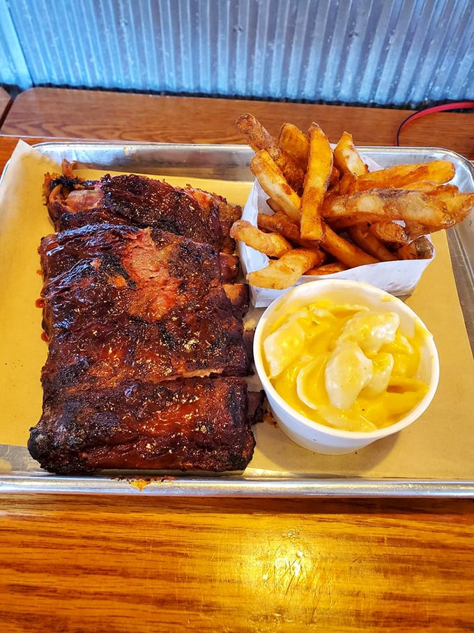 Holy smokes, Batman! These ribs look so good, they might just make you forget about your secret identity. Paired with golden fries and creamy mac, it's a superhero meal.