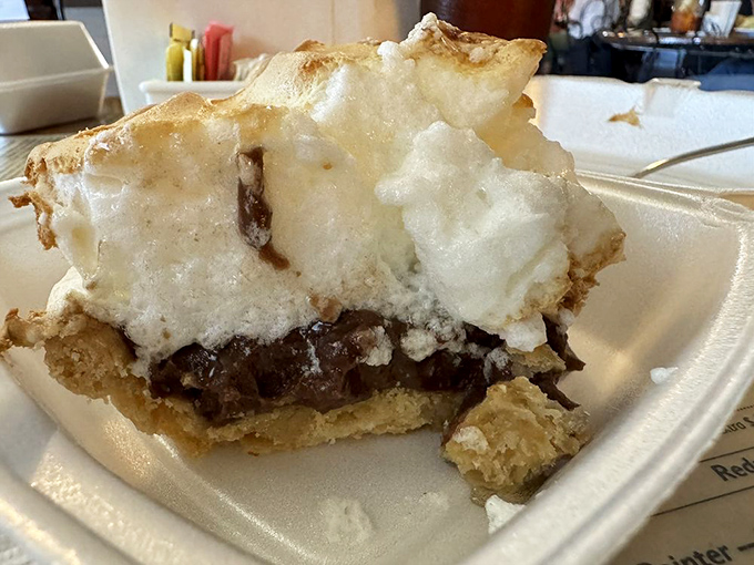 Meet the chocolate meringue pie that launched a thousand road trips. That towering cloud of meringue isn't compensating for anything&mdash;the filling beneath is equally magnificent.