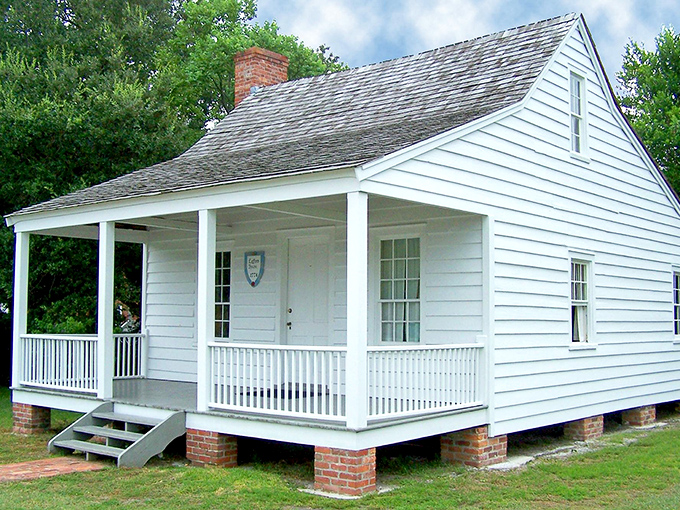 Simplicity speaks volumes in this preserved cottage, where white clapboard and a generous porch tell stories of a more deliberate time.