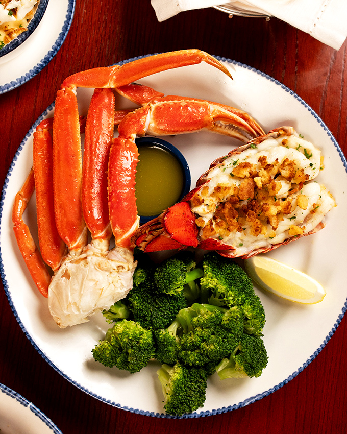The dynamic duo of the sea! This plate is like the Batman and Robin of seafood - if Batman were a succulent lobster and Robin a tender crab leg.