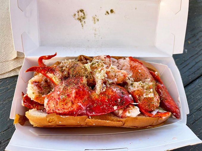 Holy crustacean! This lobster roll is bursting at the seams. It's like the seafood equivalent of hitting the jackpot.