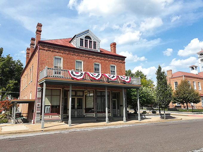 The M.S. McKenzie building anchors downtown Hermann with the quiet confidence of someone who's seen horse-drawn carriages replaced by Hondas.