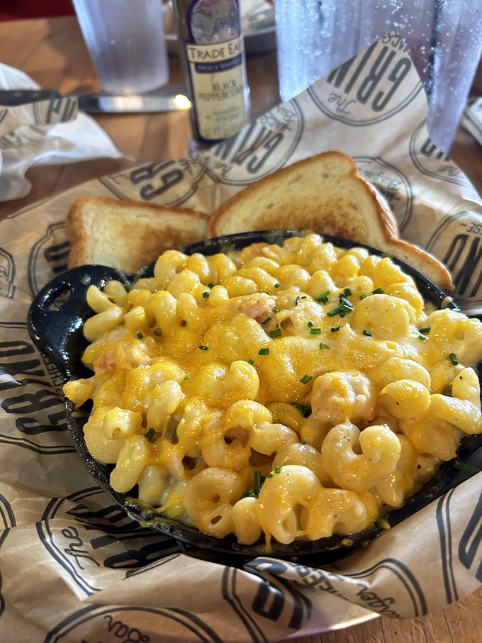 Mac and cheese nirvana served in a cast iron skillet&mdash;where pasta meets molten gold in a relationship that was clearly meant to be.