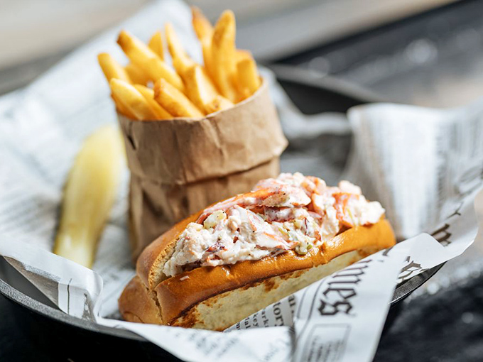 The Maine event has arrived! This lobster roll is so packed with succulent meat, it's like the Dolly Parton of sandwiches – voluptuous and irresistible.