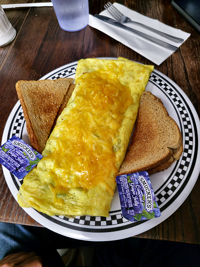 Feast your eyes on the Mona Lisa of morning meals. This omelet is so perfectly folded, it could teach origami classes on the side.