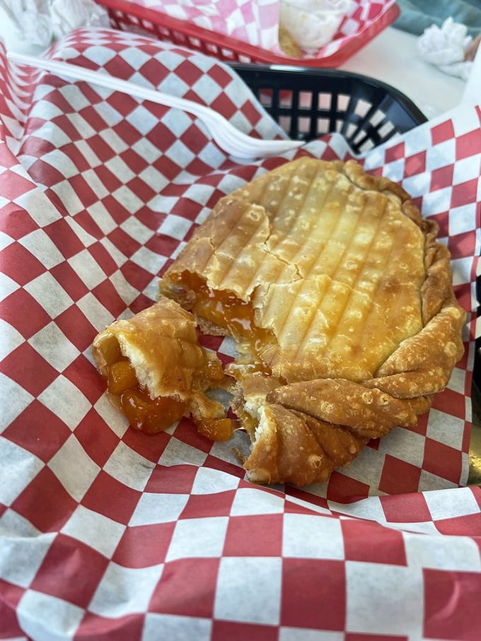 Holy peaches and cream! This fried pie looks like it's ready to audition for a starring role in your next sweet dream.