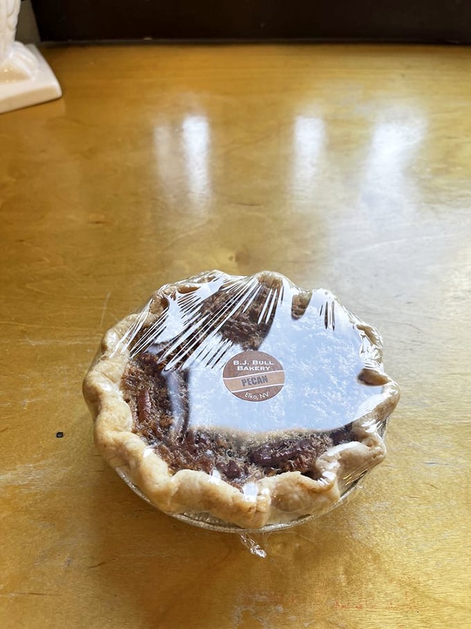 Pecan pie so good, it should be illegal! This little slice of heaven is like a warm, gooey hug for your soul.