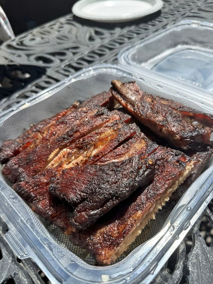 Holy smoke rings, Batman! These ribs aren't just fall-off-the-bone tender; they're practically begging to jump onto your plate.