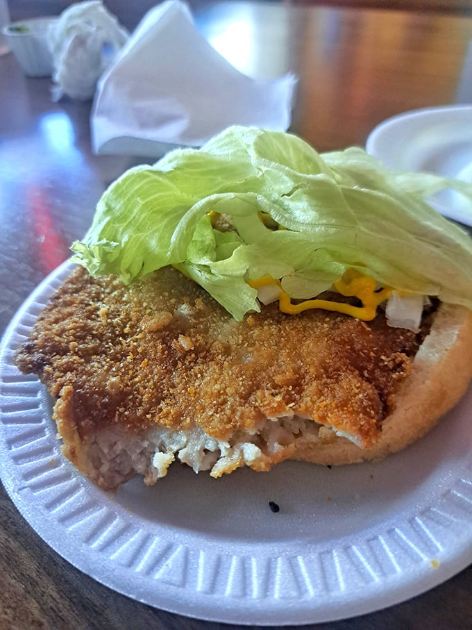 The star of the show: a pork tenderloin sandwich so massive it makes the bun look like it's playing a supporting role.