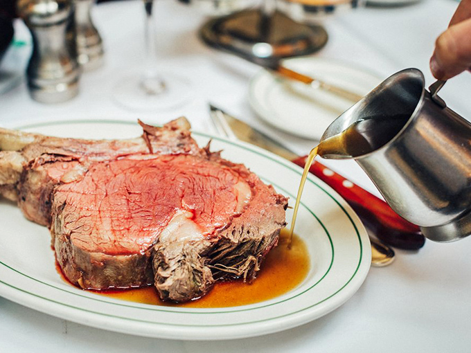 The prime rib arrives like royalty with its own entourage&mdash;a golden pool of jus that should be classified as a controlled substance.
