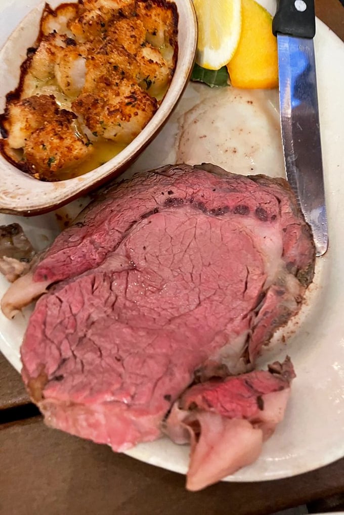 Surf and turf perfection! This plate is like the Avengers of dinner - prime rib and baked scallops joining forces to save your appetite.