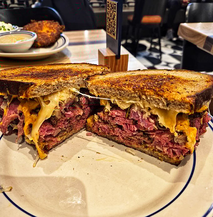 Behold, the mighty Reuben! This sandwich isn't just lunch; it's a work of art. Layers of flavor stacked higher than your weekend to-do list.