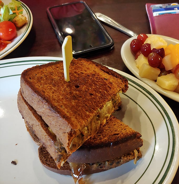 The Reuben: a sandwich so mighty, it needs a toothpick to keep its act together. Corned beef, sauerkraut, and enough cheese to make Wisconsin jealous.