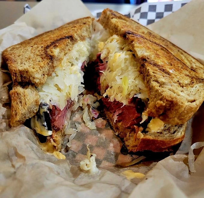 Holy corned beef, Batman! This Reuben is stacked higher than my hopes for retirement.