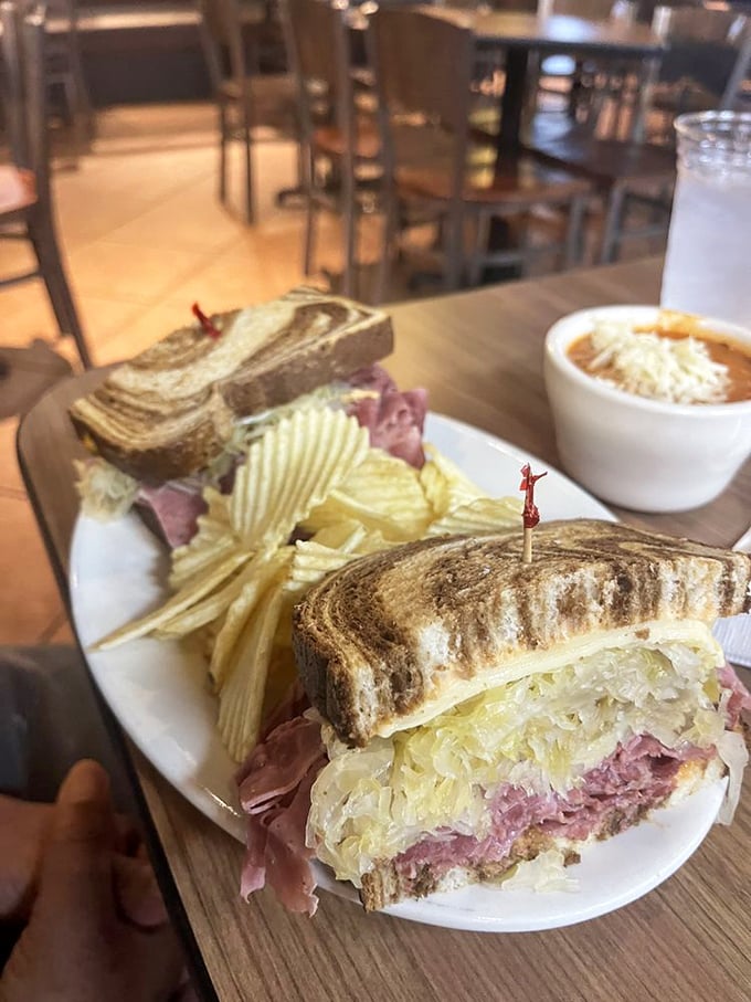 Behold, the Reuben in all its glory! This sandwich is stacked higher than my hopes for retirement.