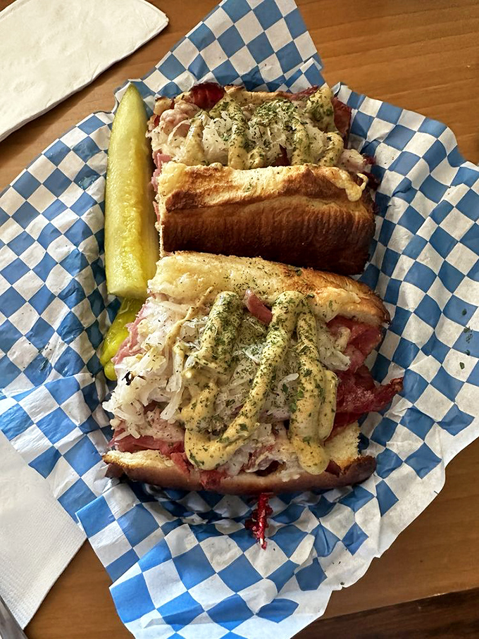 Holy moly, it's sandwich royalty! This Reuben is stacked higher than my hopes for winning the lottery.