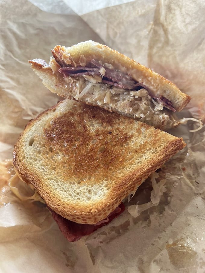 Behold the Reuben in all its glory! Layers of corned beef, Swiss cheese, and sauerkraut create a tower of flavor that would make the Empire State Building jealous.